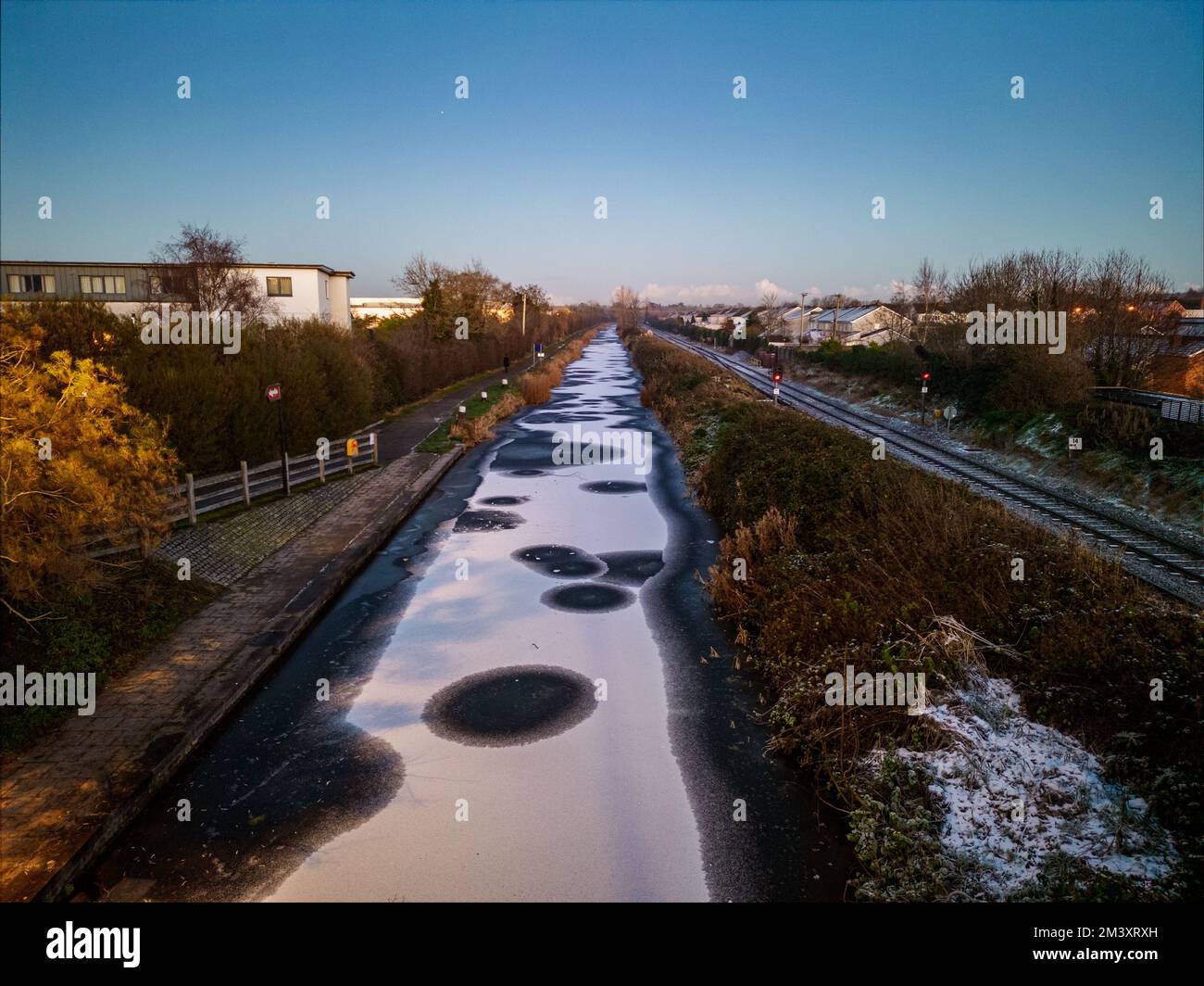 A frozen over Royal Canal on a cold December evening Stock Photo - Alamy