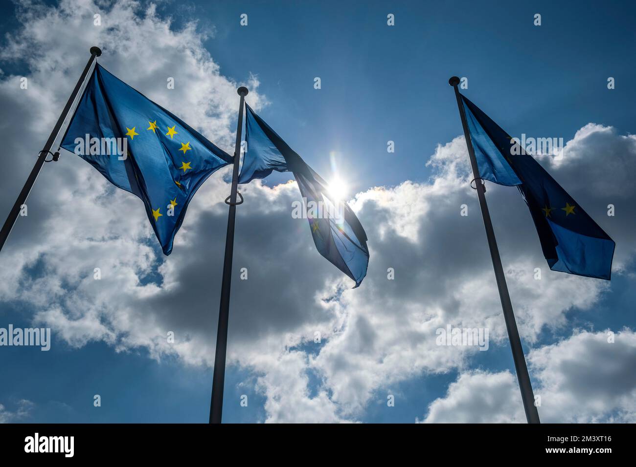 Several official European Flags with the blue and the yellow stars are ...