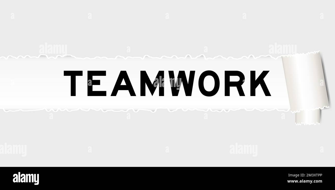 Ripped gray paper background that have word teamwork under torn part ...