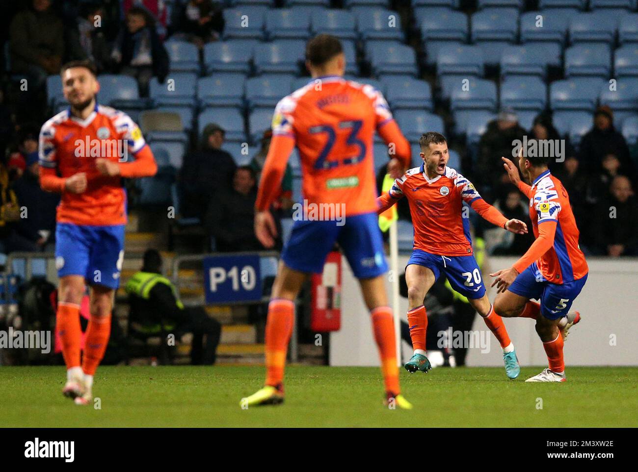 Swansea City's Liam Cullen (second right) celebrates scoring their side ...