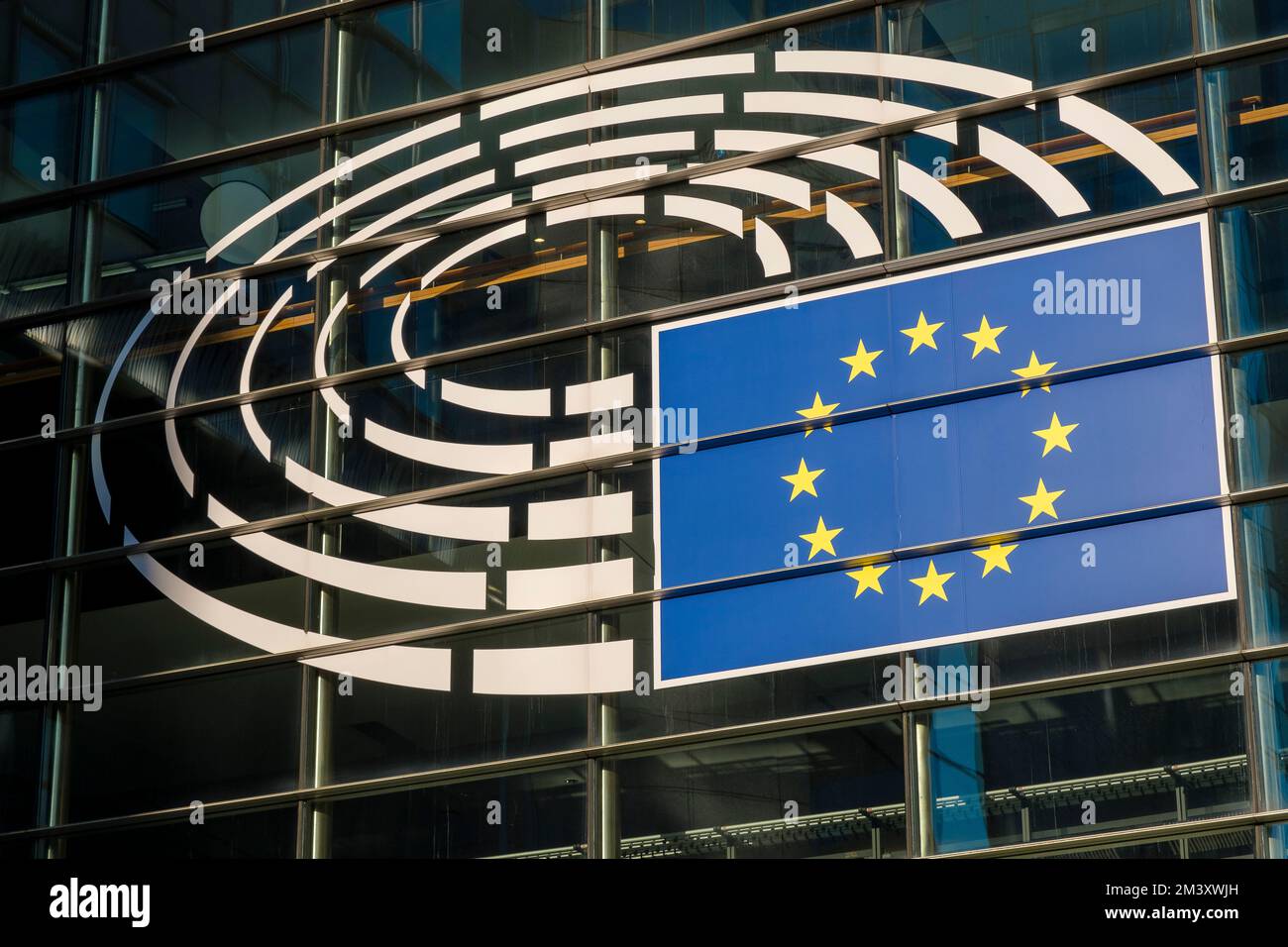 The european parliament facade and its stylised hemicycle logo with the ...