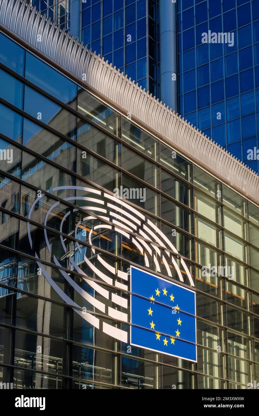 The european parliament facade and its stylised hemicycle logo with the ...