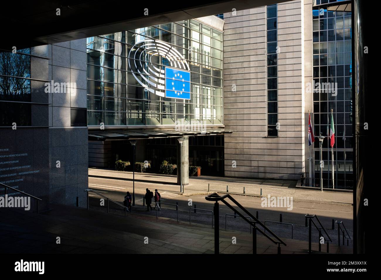 The european parliament facade and its stylised hemicycle logo with the ...