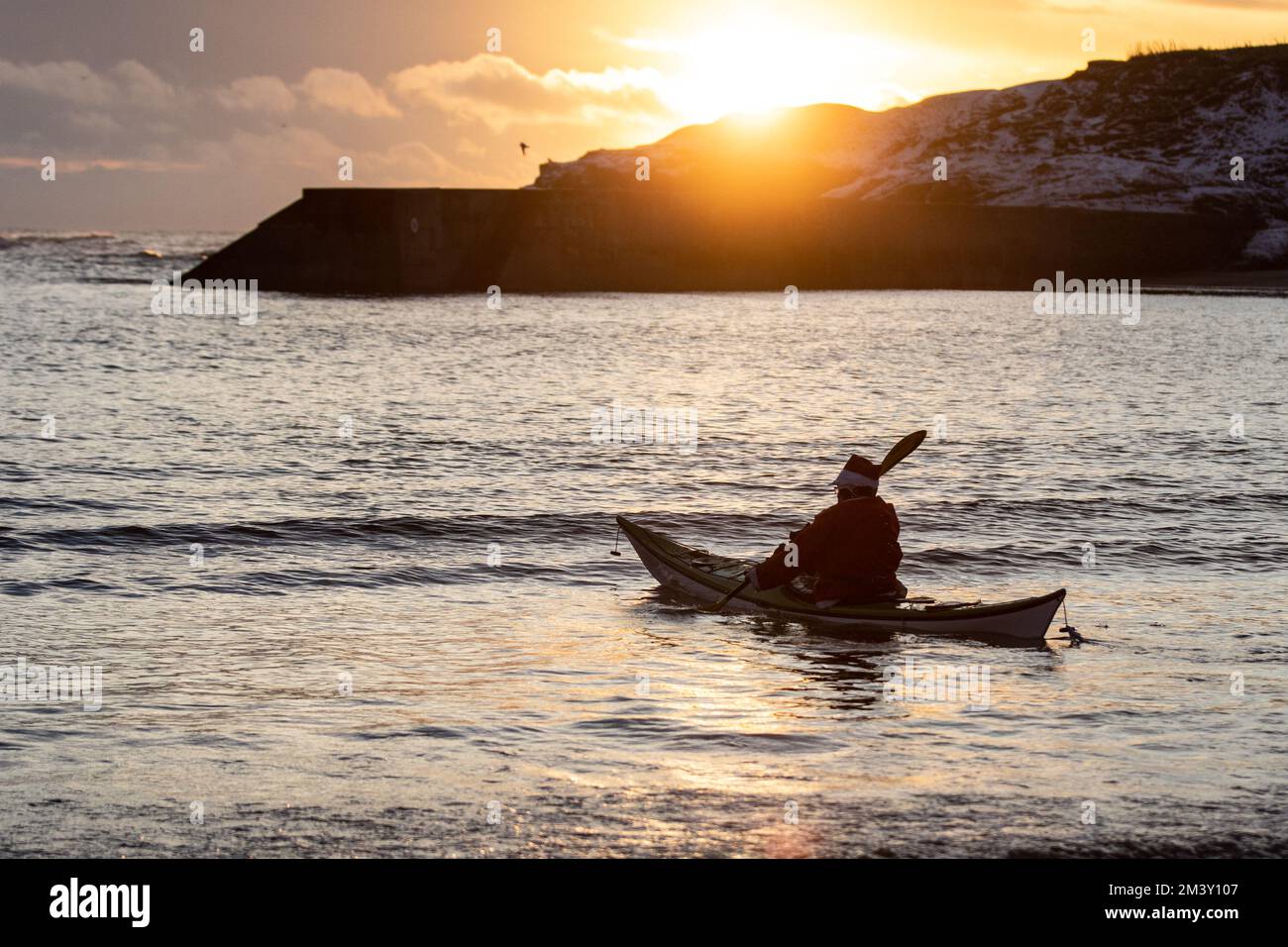 Cullercoats, UK - Cullercoats Outdoor Swimmers charity Elf Dip in the ...