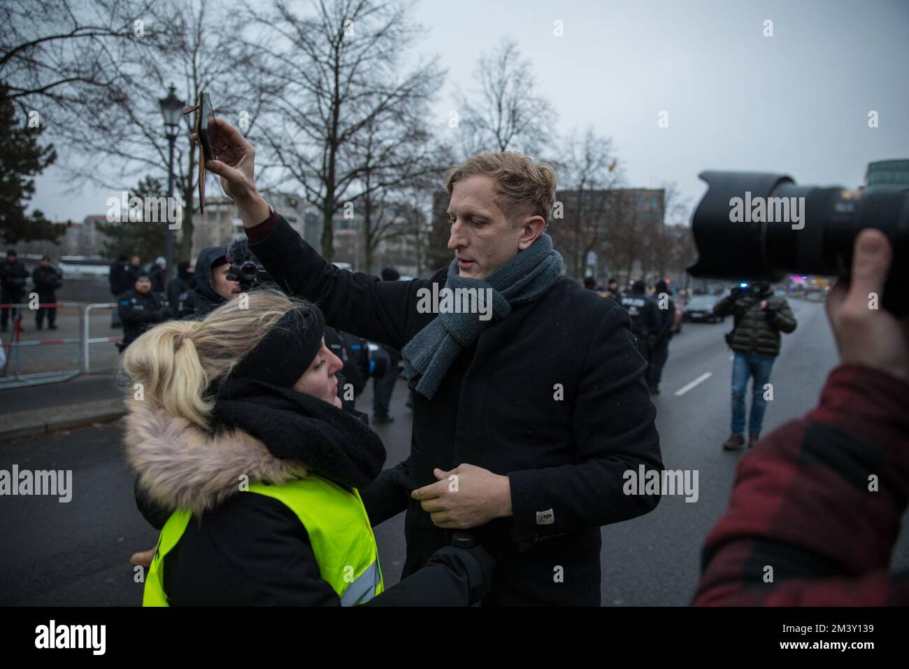 During the protest, Lenz jumped out of a vehicle and shouted "murderer ...