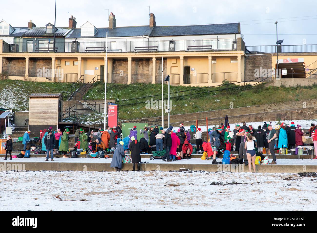Cullercoats, UK - Cullercoats Outdoor Swimmers charity Elf Dip in the ...