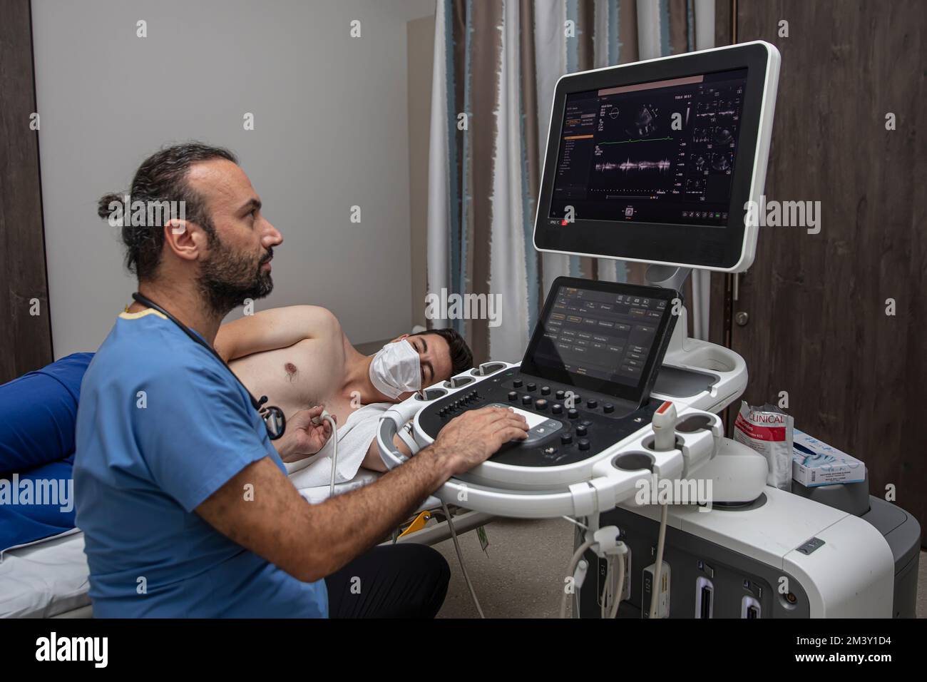 Istanbul, Turkey - September 20, 2022 ; Doctor examining patient using ...