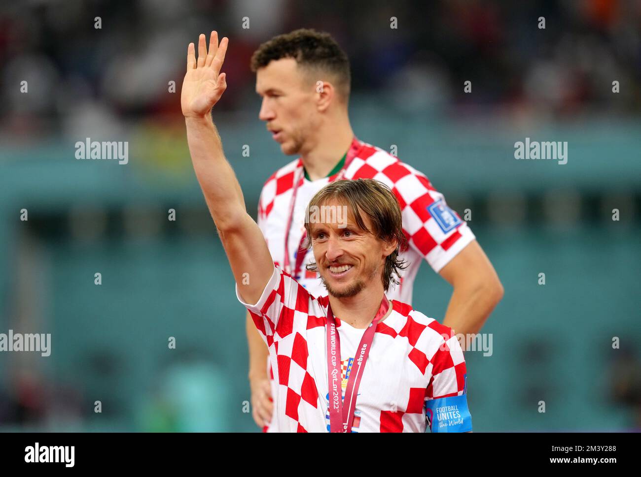 Croatia's Luka Modric waves to the fans after being presented with his ...