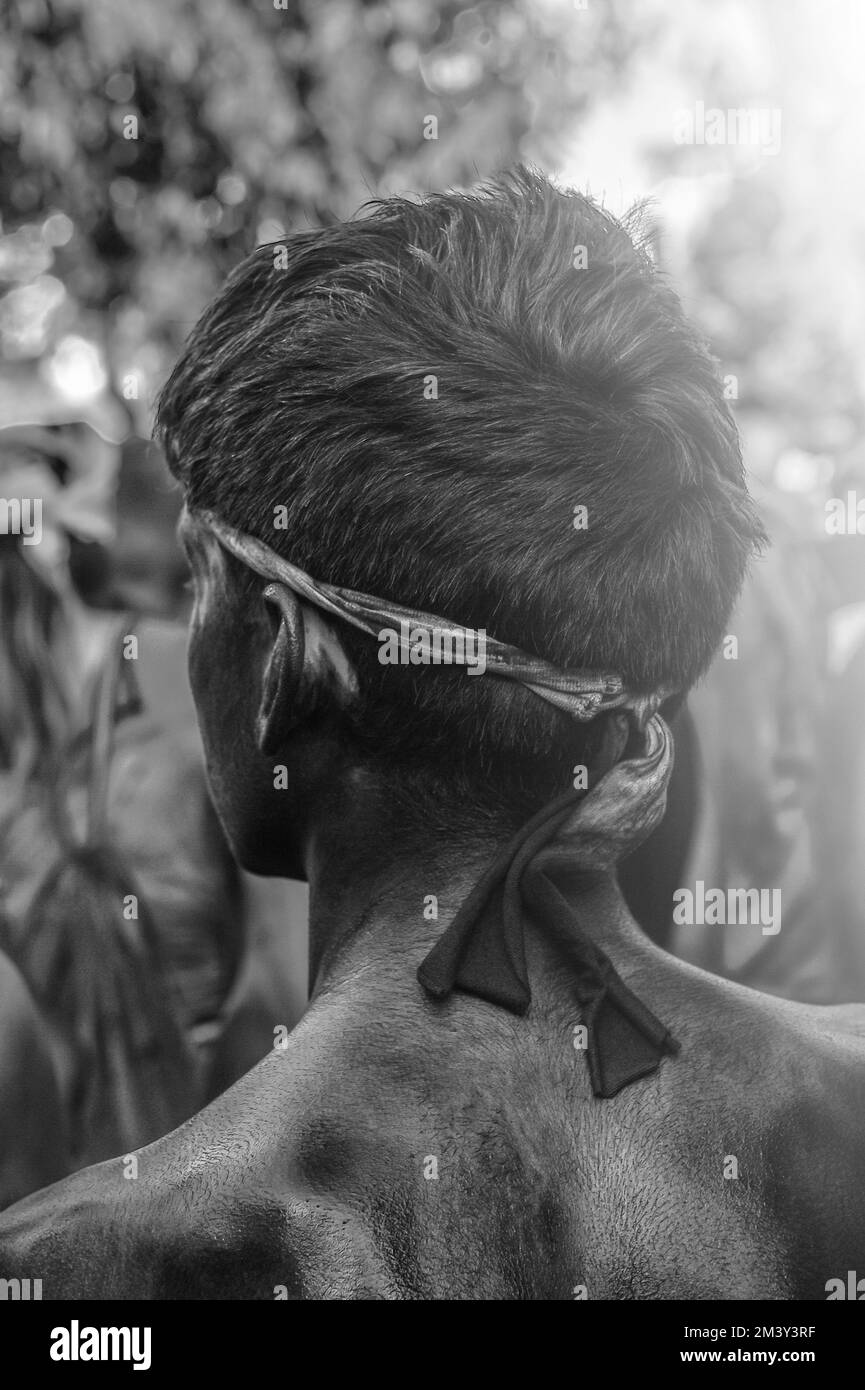 Head of a youHead of a young boy, smeared with black paintng boy ...