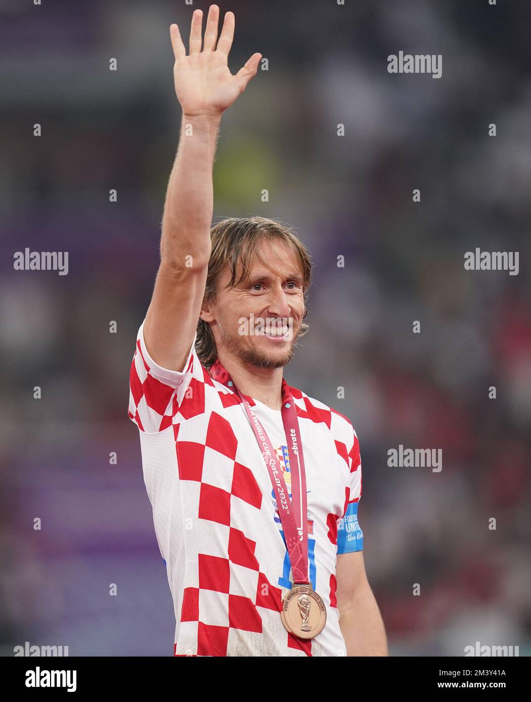 Croatia's Luka Modric waves after receiving his bronze medal after the ...