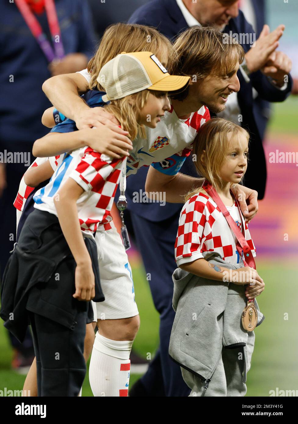 Doha, Qatar. 17th Dec, 2022. Luka Modric (2nd R) of Croatia reacts with ...