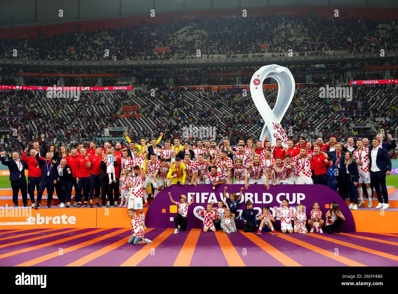 Croatia players celebrate after winning the FIFA World Cup third place ...