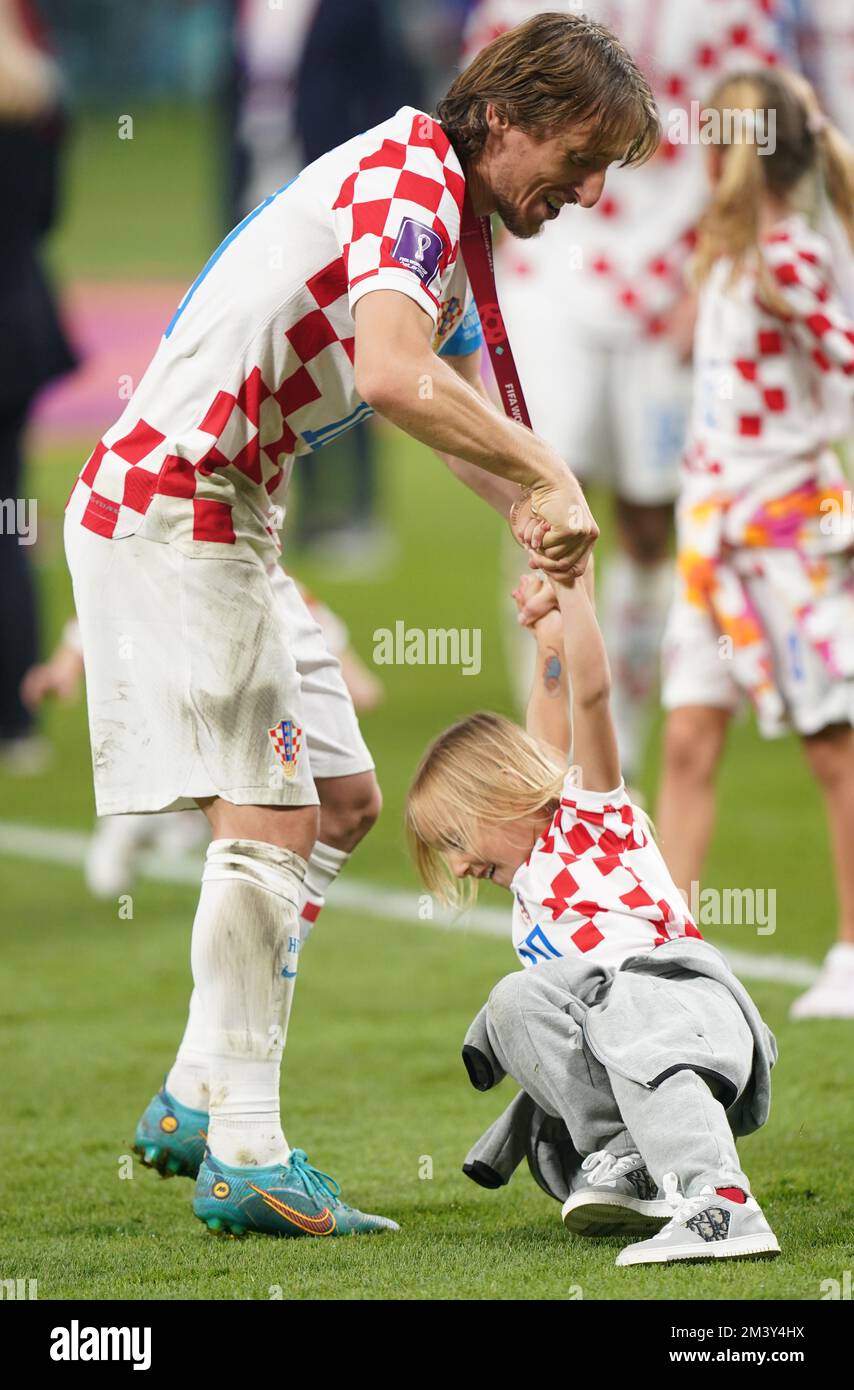 Croatia's Luka Modric with his daughter on the pitch after the FIFA ...