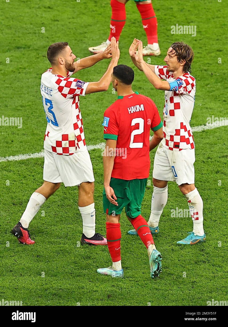 Doha, Qatar. 17th Dec, 2022. Nikola Vlasic (L) and Luka Modric (R) of ...