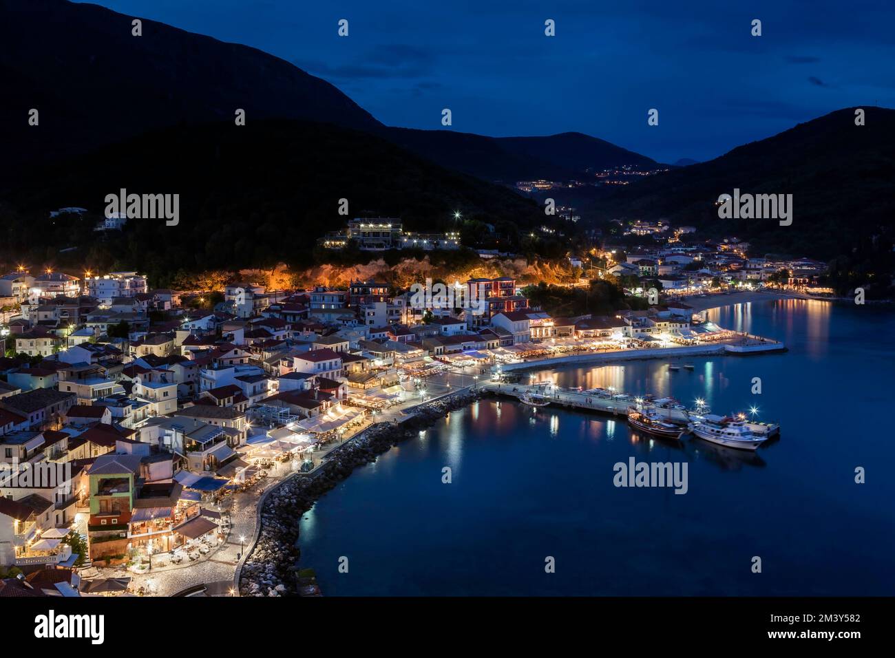 Night view of Parga town, a beautiful coastal town in northern Greece ...