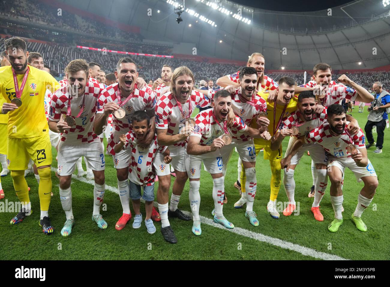 Croatia's players celebrate winning the FIFA World Cup third place play ...
