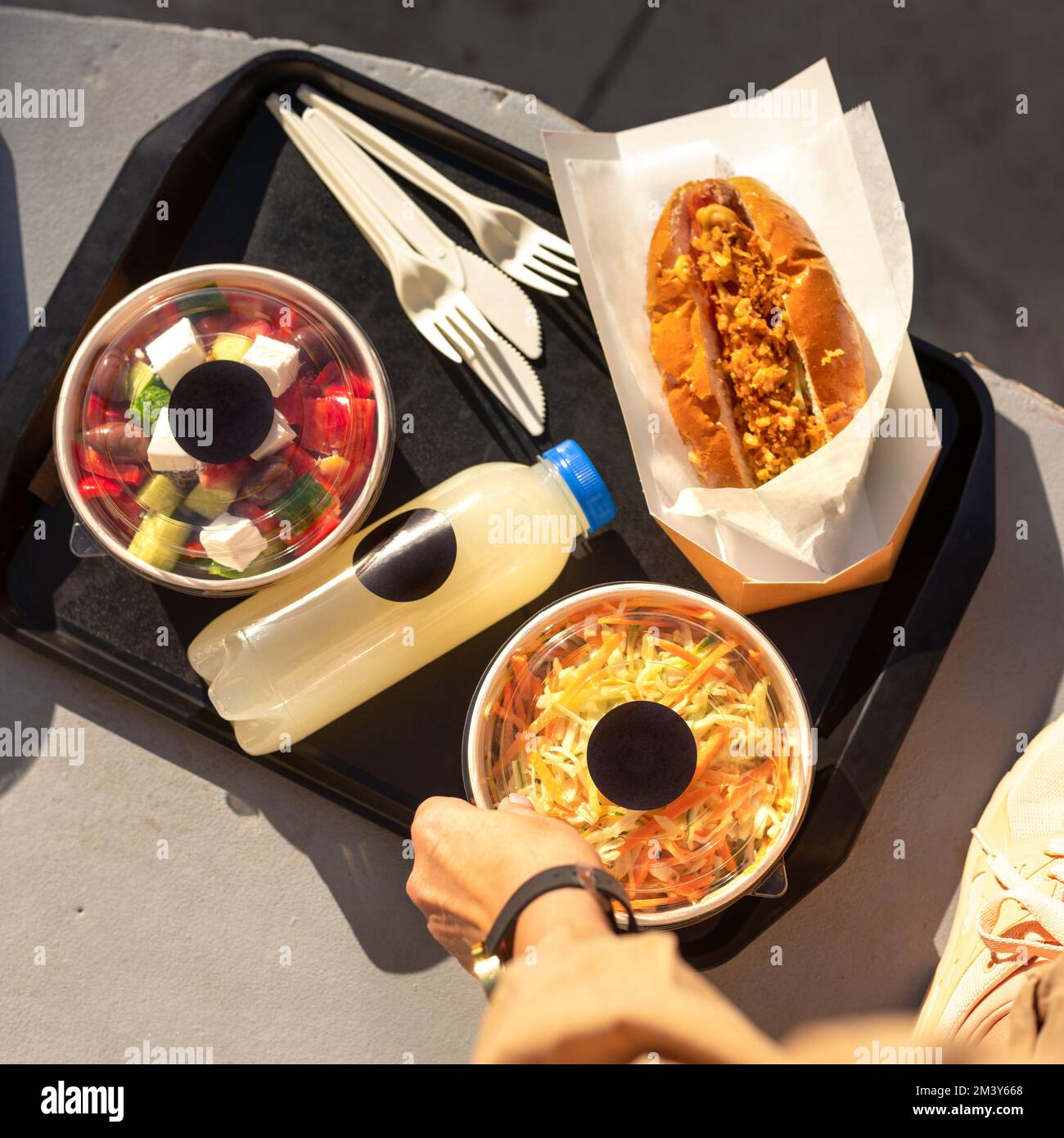 American fast food specialties. lunch on a tray, salads and a hot dog ...