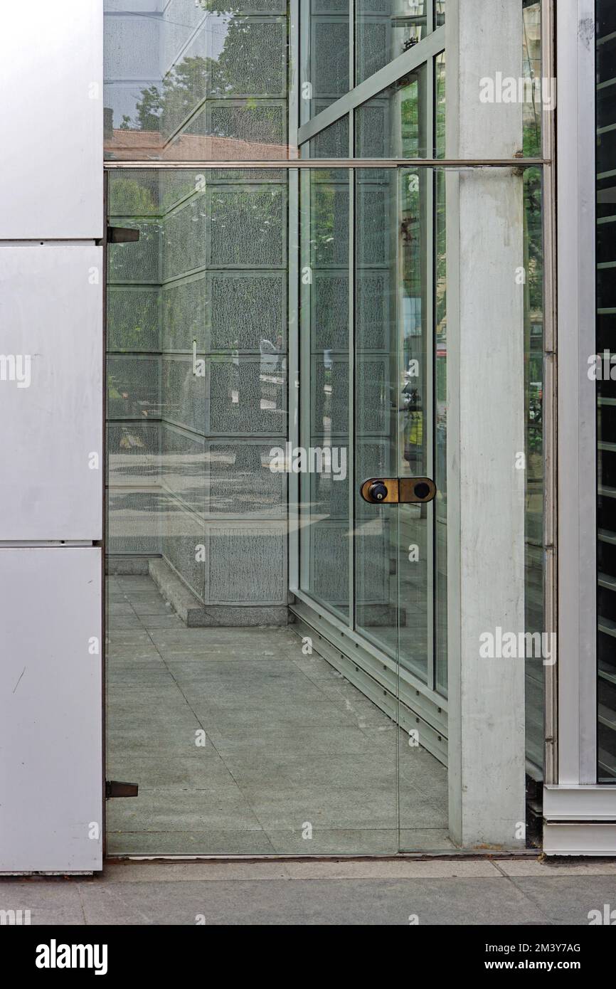 Closed clean glass door at modern building entrance from street Stock ...