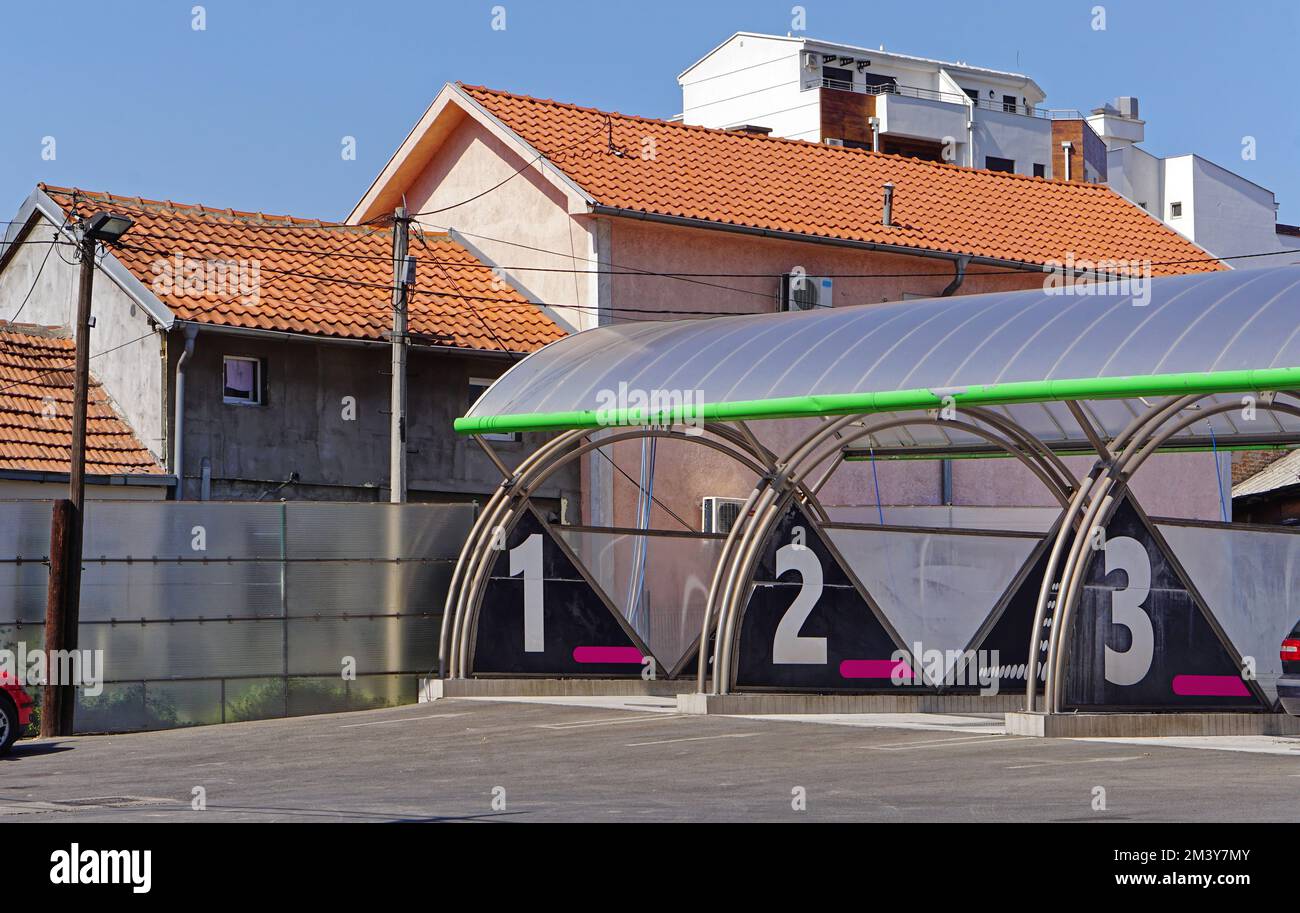Self service car wash with multiple bays Stock Photo - Alamy