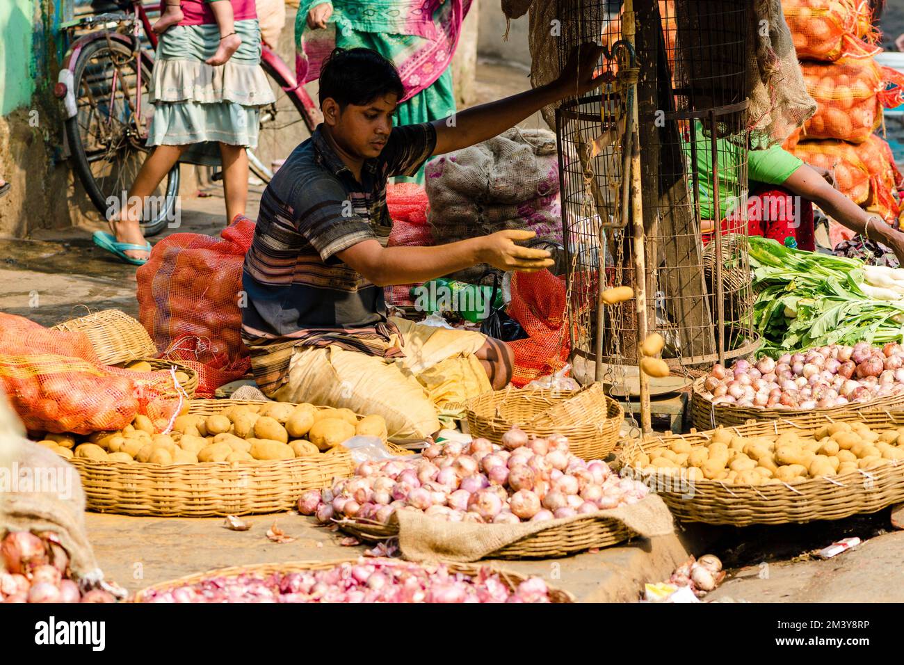 Vegetable-seller in the streets Stock Photo - Alamy