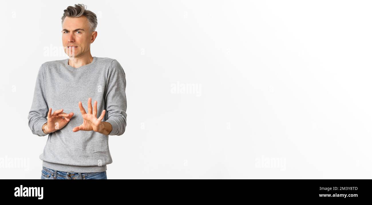 Portrait of reluctant middle-aged man avoiding something bad, shaking ...