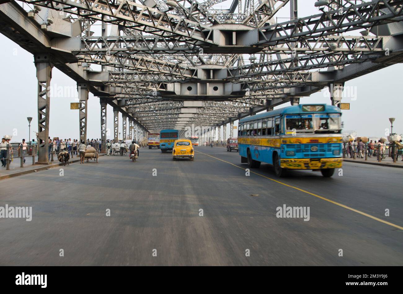 The impressive 705 m long Howrah-Bridge, opened in 1943, connecting ...