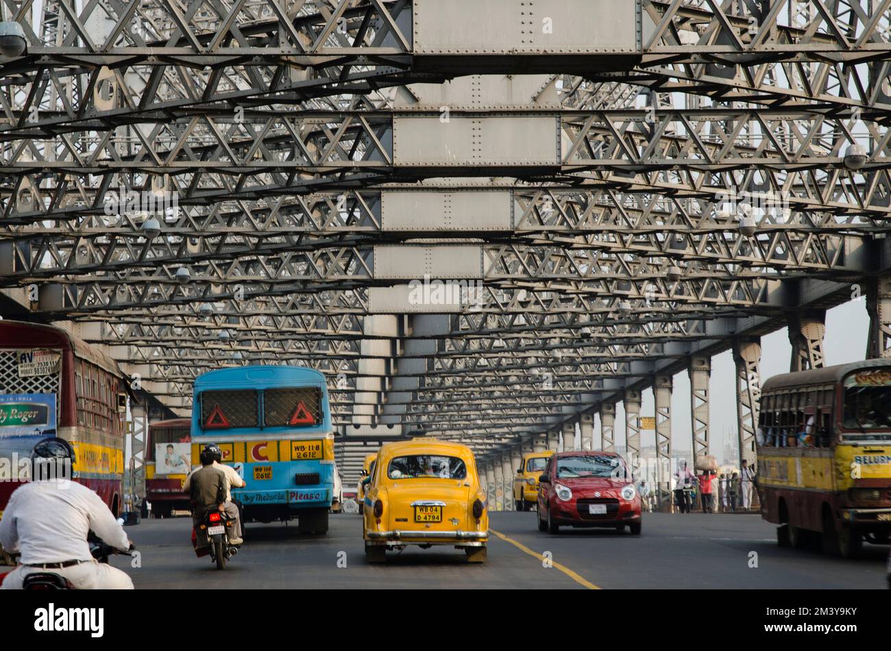 The impressive 705 m long Howrah-Bridge, opened in 1943, connecting ...
