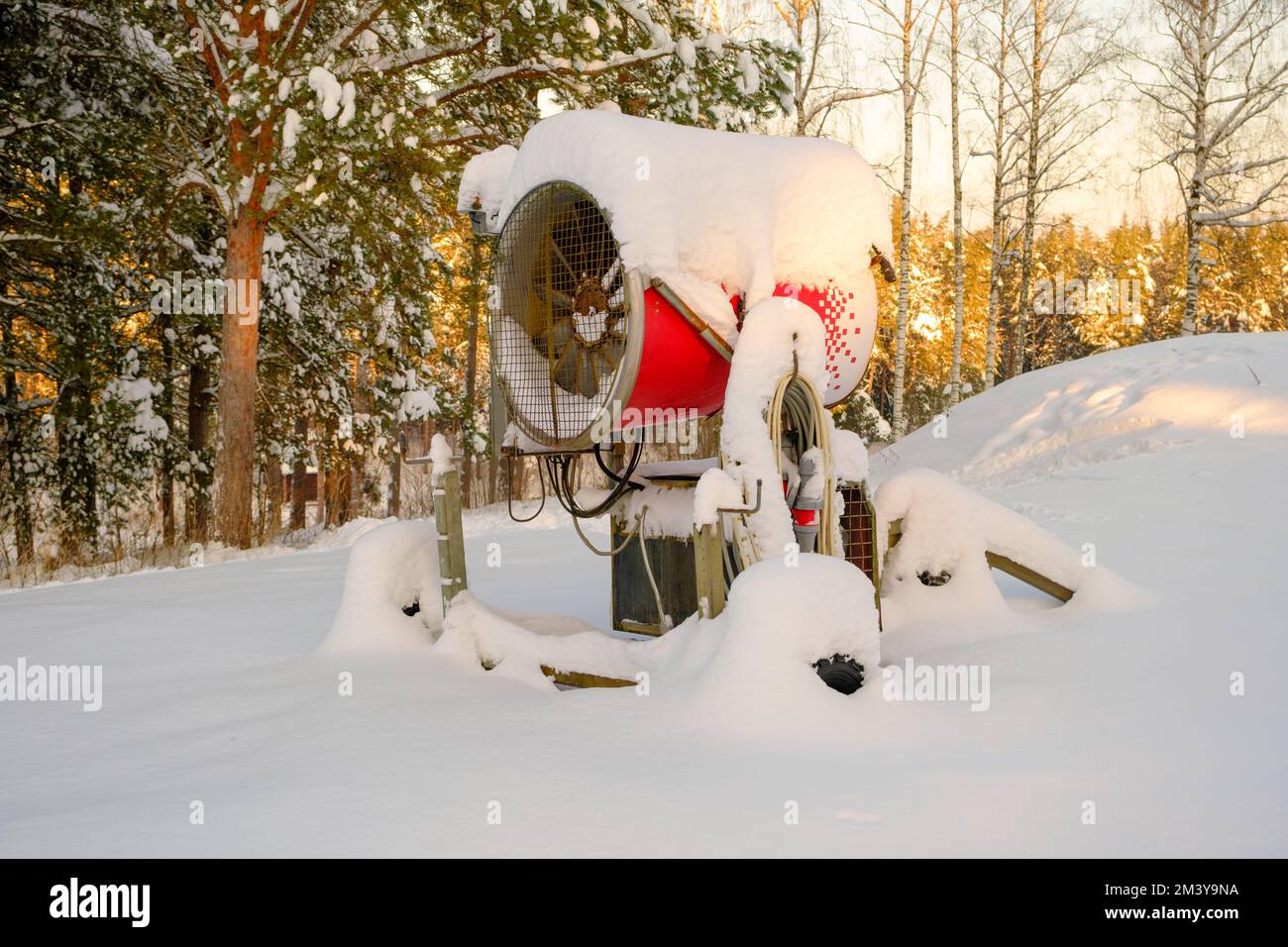 A snow gun that sprays artificial ice crystals. Snow making machine ...