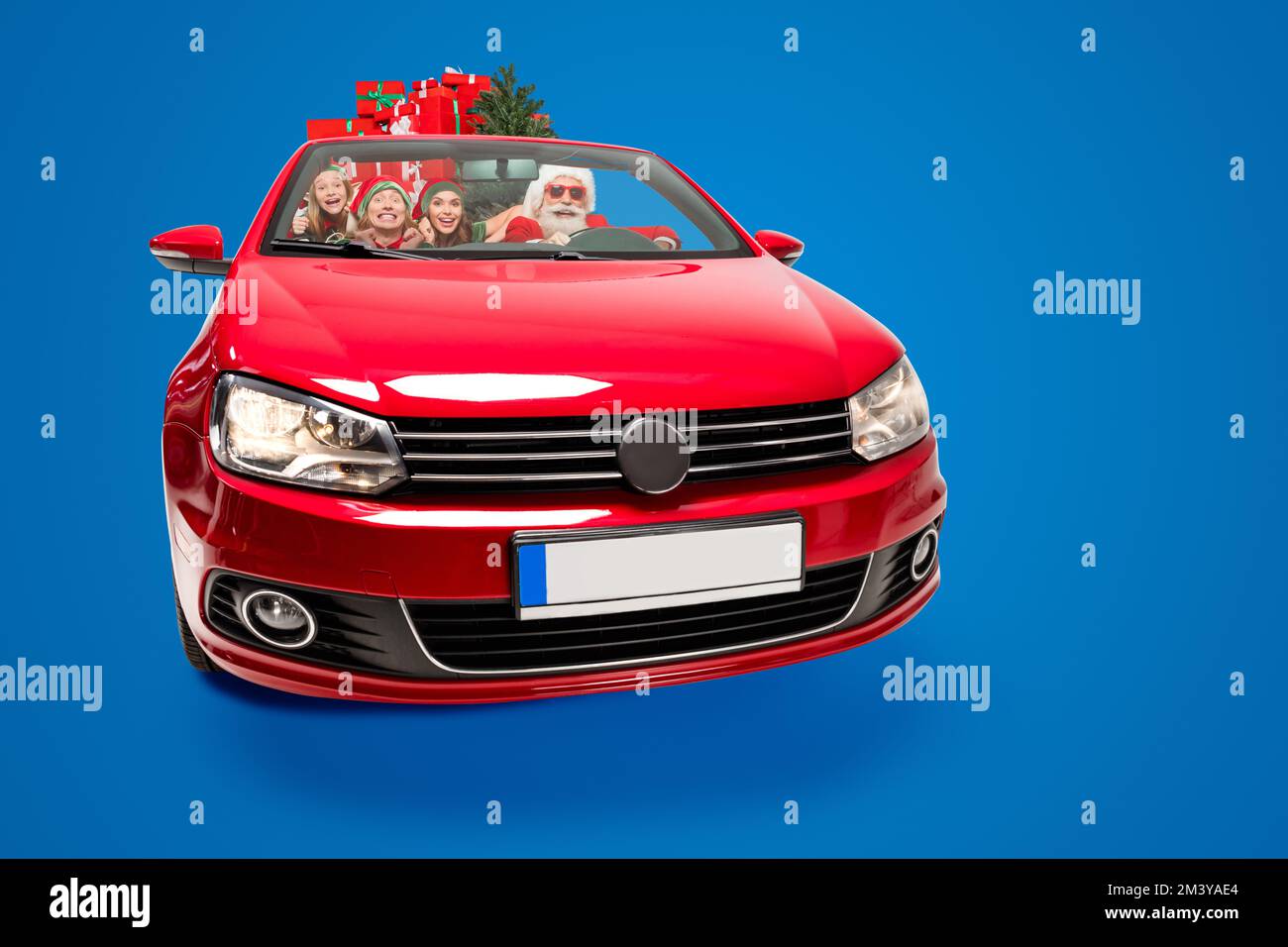 Photo of cheerful funky santa claus helpers wear costumes riding red ...