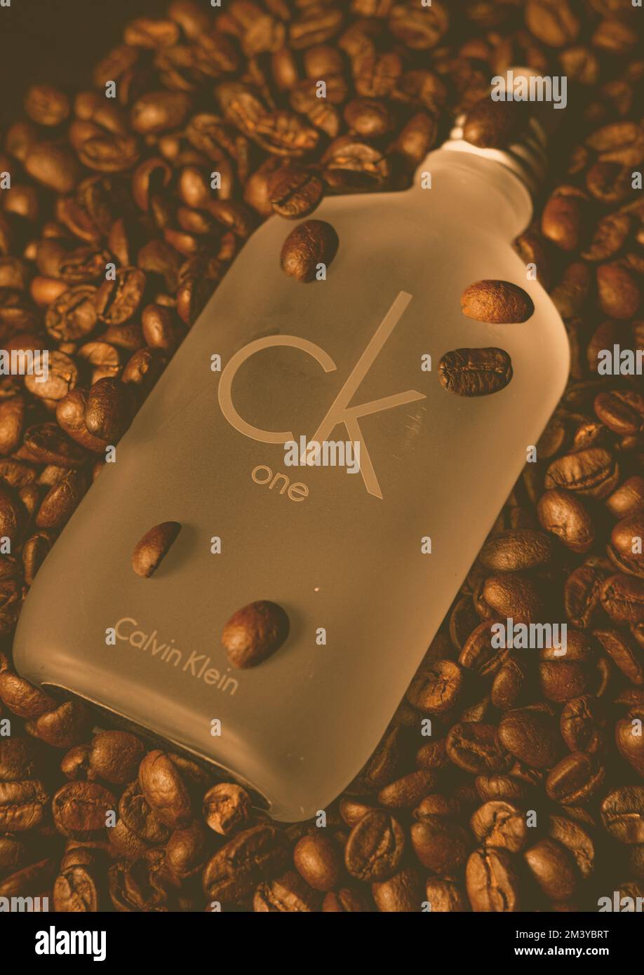 A vertical shot of the Calvin Klein One on coffee beans background Stock Photo - Alamy