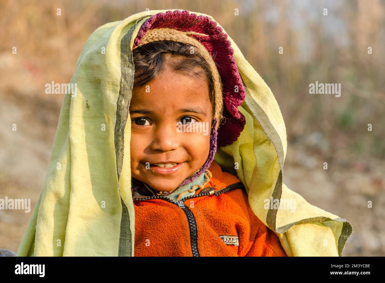 Portrait of a little boy, playing on the street Stock Photo - Alamy