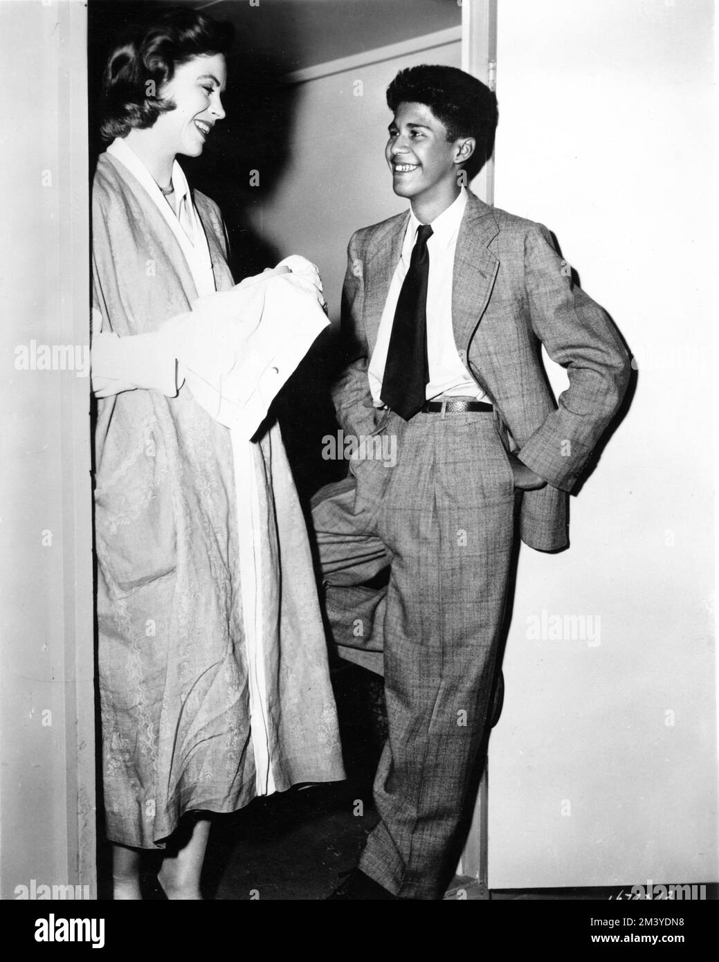 Co-Stars DOROTHY McGUIRE and RAFAEL CAMPOS on set candid outside ...