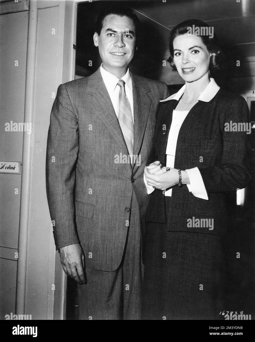 Co-Stars JOHN HODIAK and DOROTHY McGUIRE on set candid outside Dressing ...