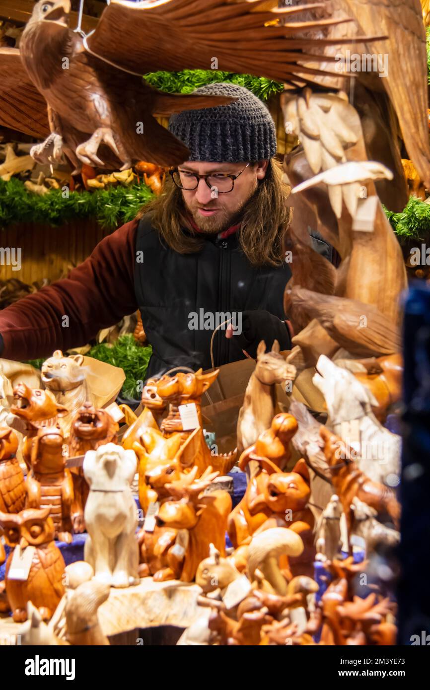 Chicago, IL, USA - December 16, 2022: Shopkeeper selling Christmas ...