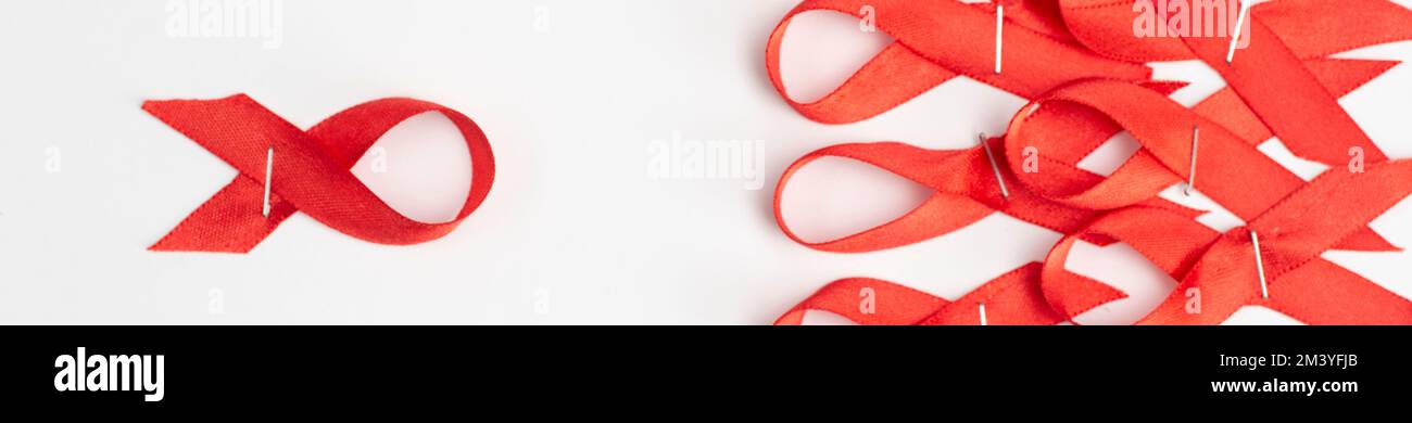 Health care and medicine concept. AIDS awareness. Red awareness ribbons ...