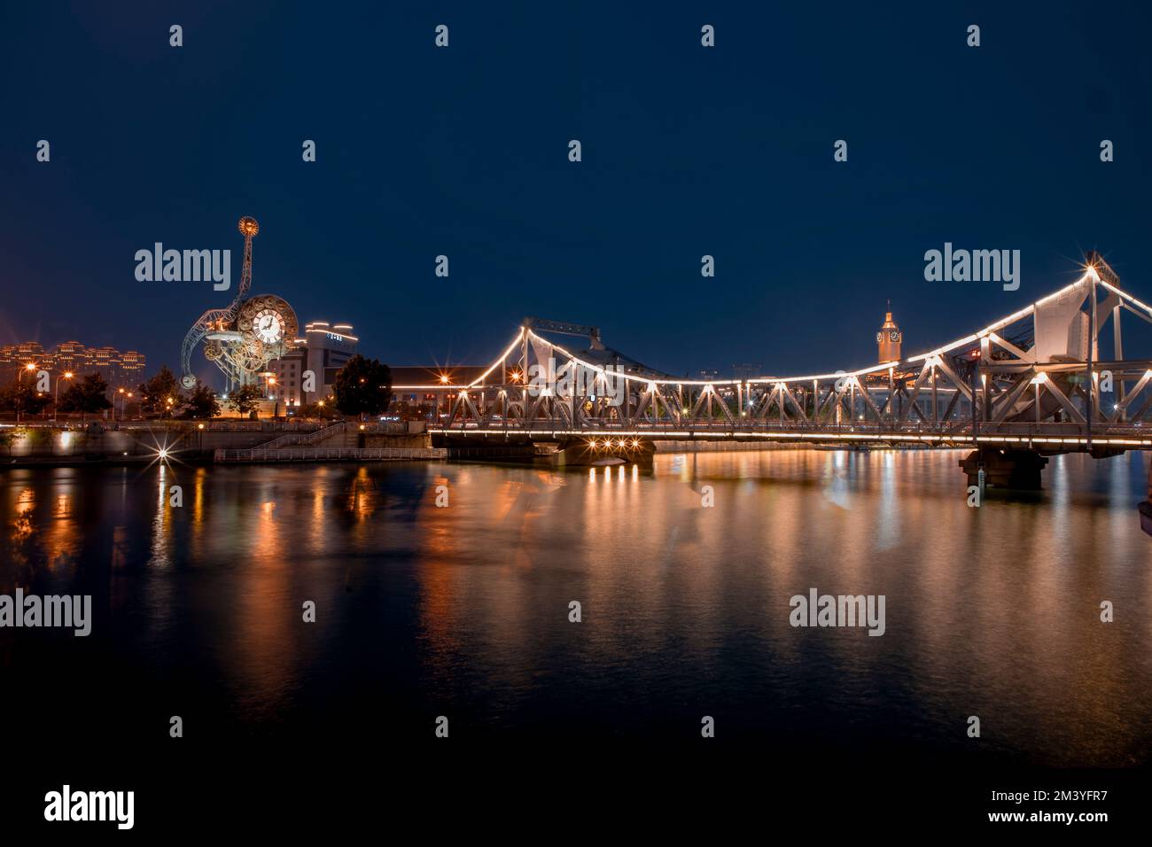 A night view of Liberation Bridge by the Haihe River in Century Bell ...
