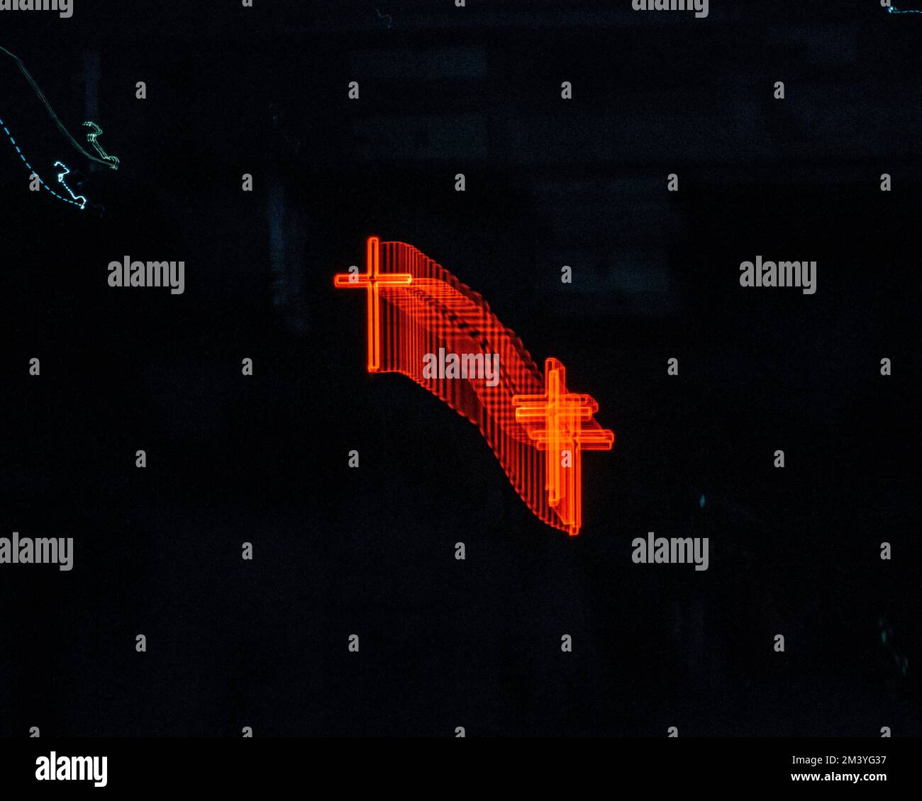 A long exposure shot of a red neon cross isolated on an empty black background Stock Photo - Alamy