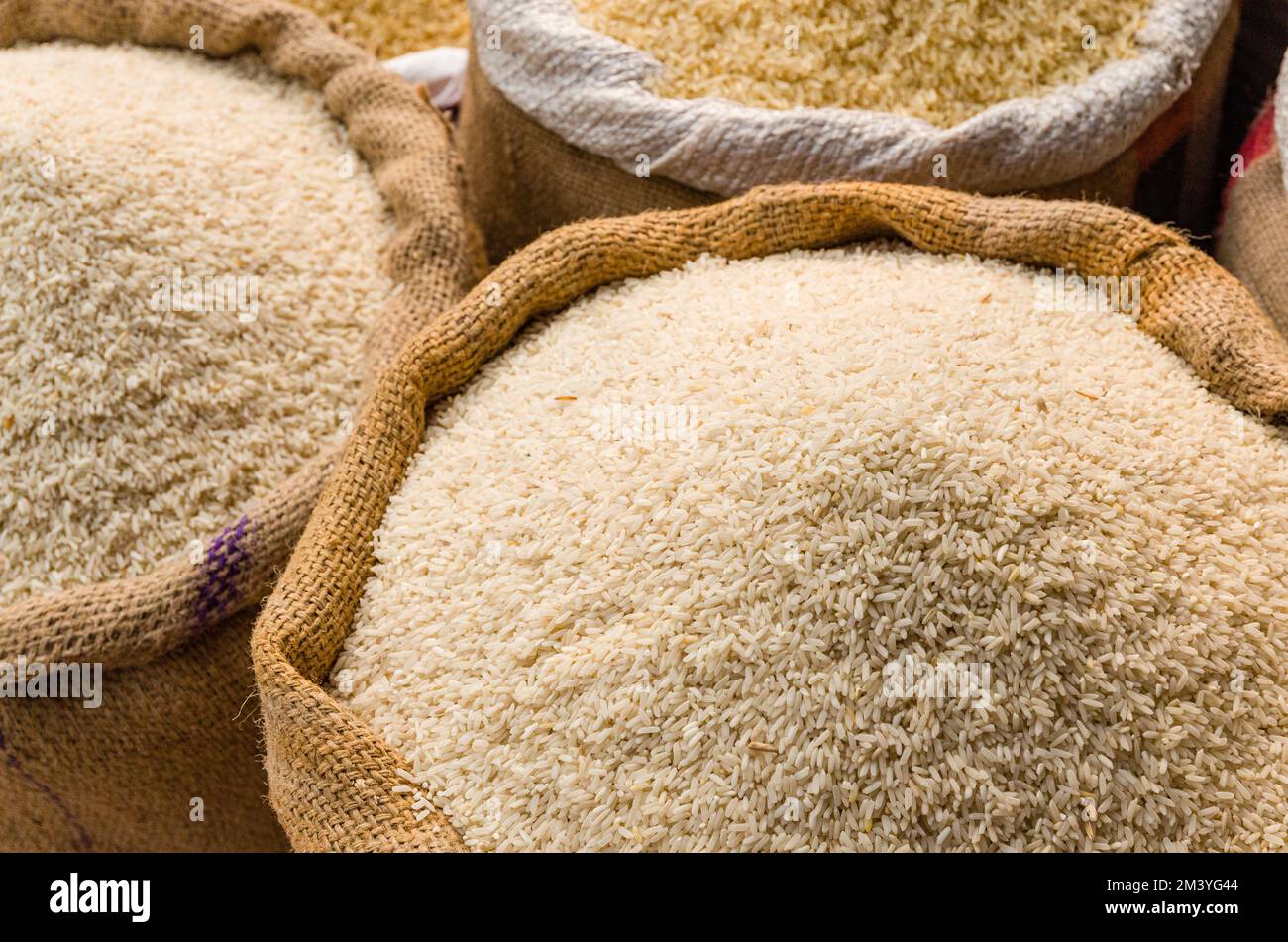 Different types of rice are available on the street market in Paharganj ...