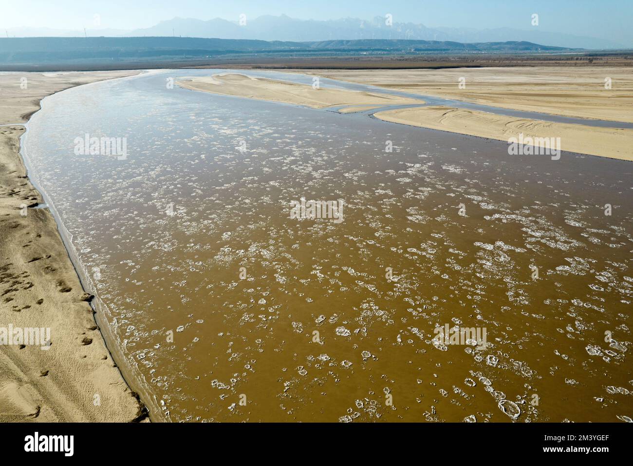 YUNCHENG, CHINA - DECEMBER 17, 2022 - Aerial photo shows ice flowing at the Fengling Ferry ...