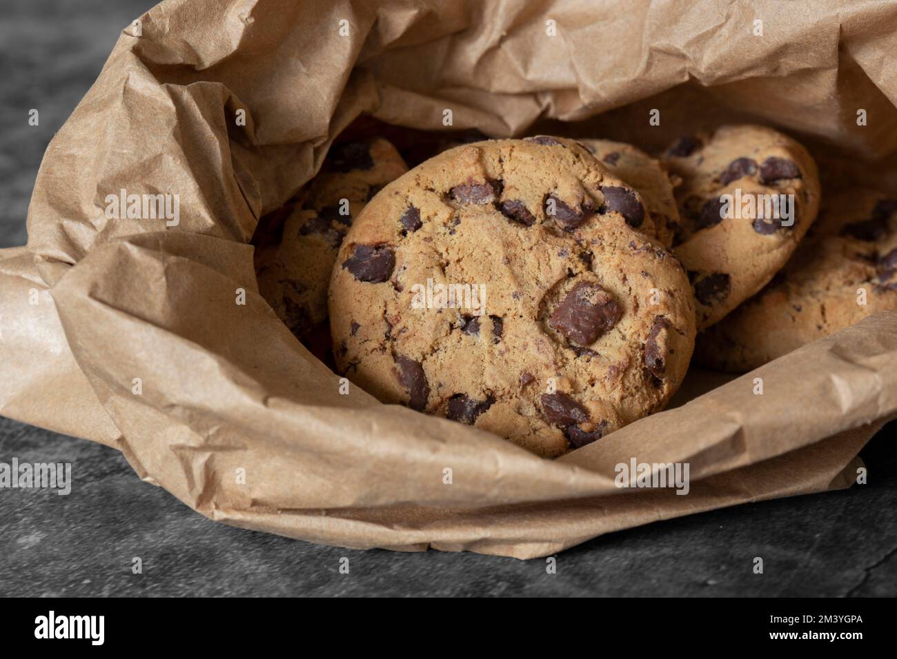 Chocolate chip cookies in a brown paper bag. Eco friendly recycling ...