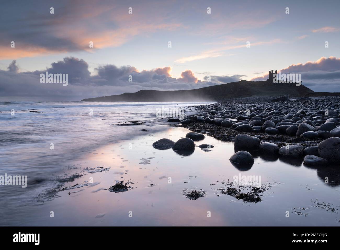 Dunstanburgh castle and embleton bay hi-res stock photography and ...
