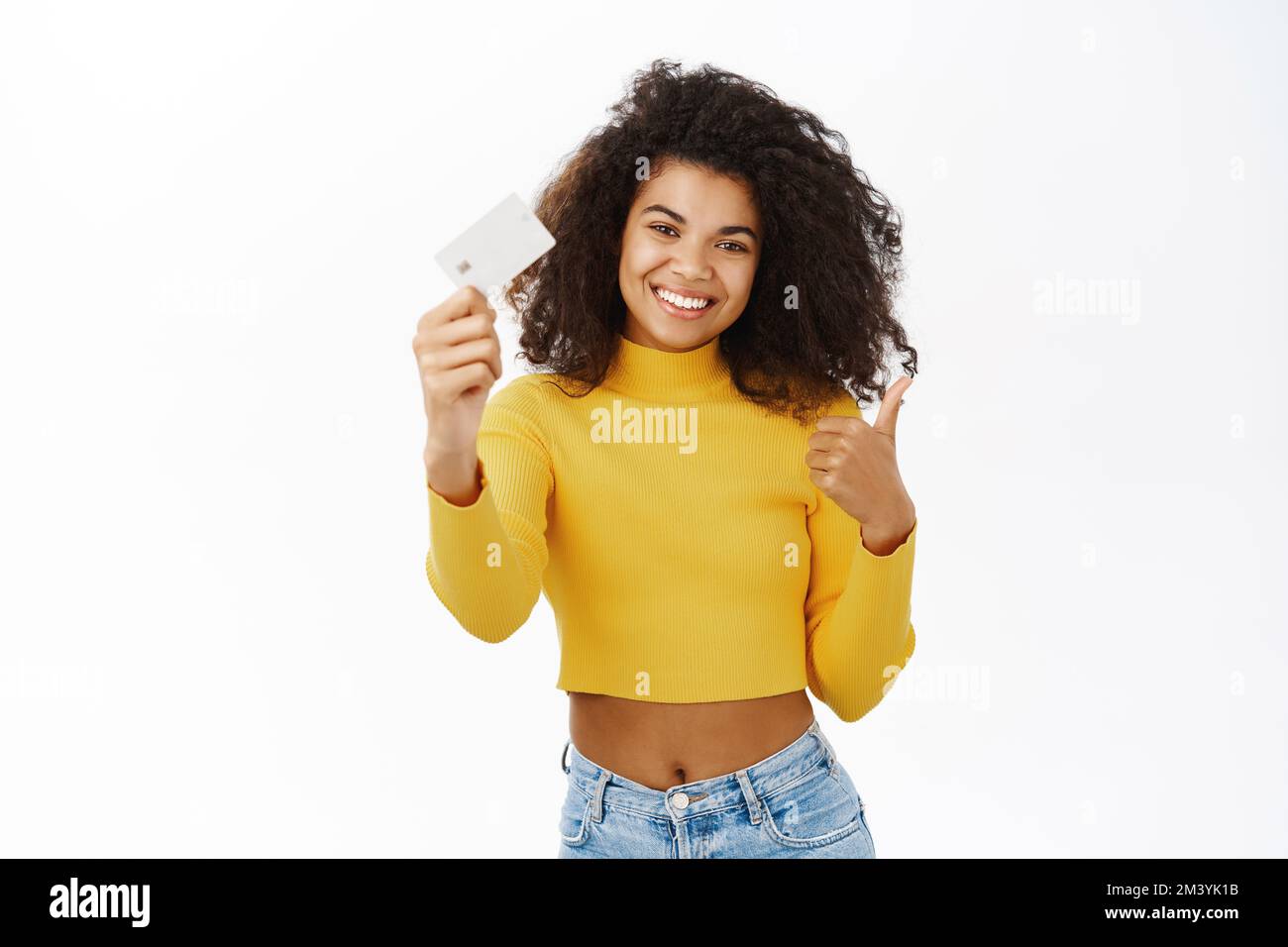 Beautiful Black girl shows her credit card, student id or discount in ...