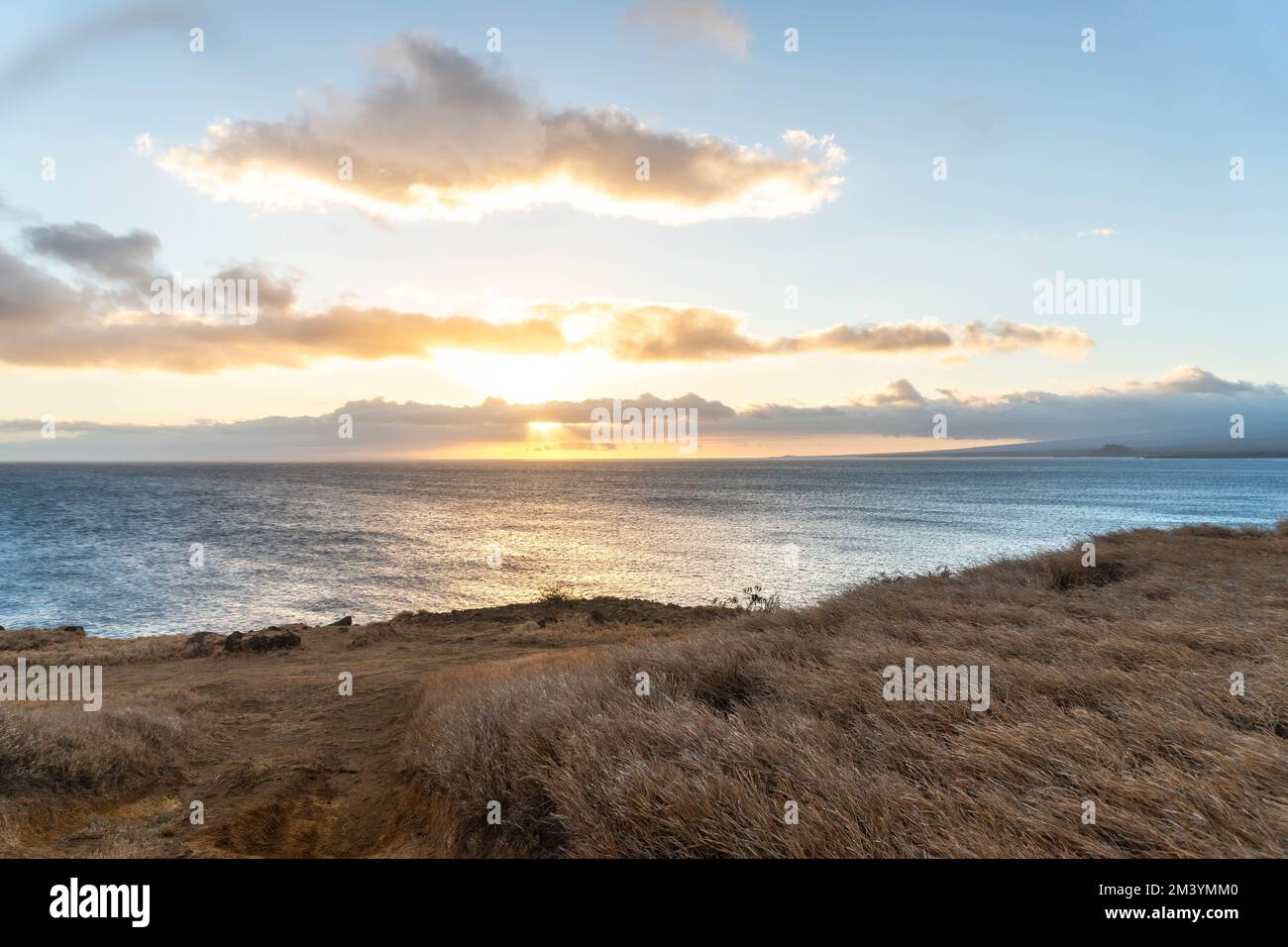 Hawaiian cliff sunset Stock Photo - Alamy