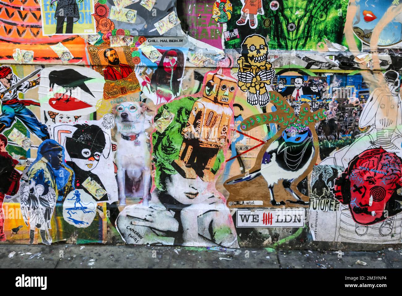 Paste-up street art, Shoreditch, London. December 2022 Stock Photo - Alamy