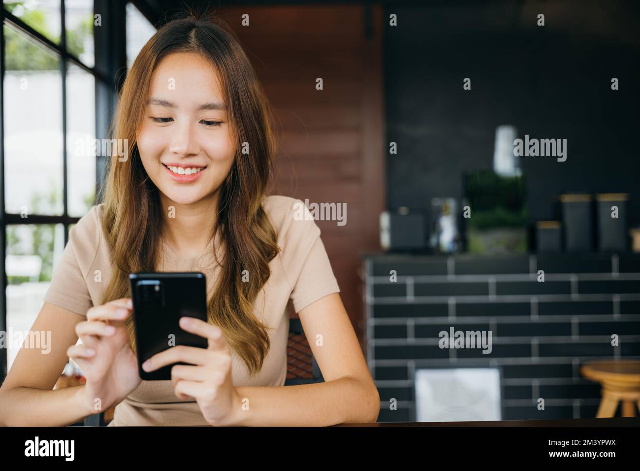 female hands holding and typing to communicate with others through on ...