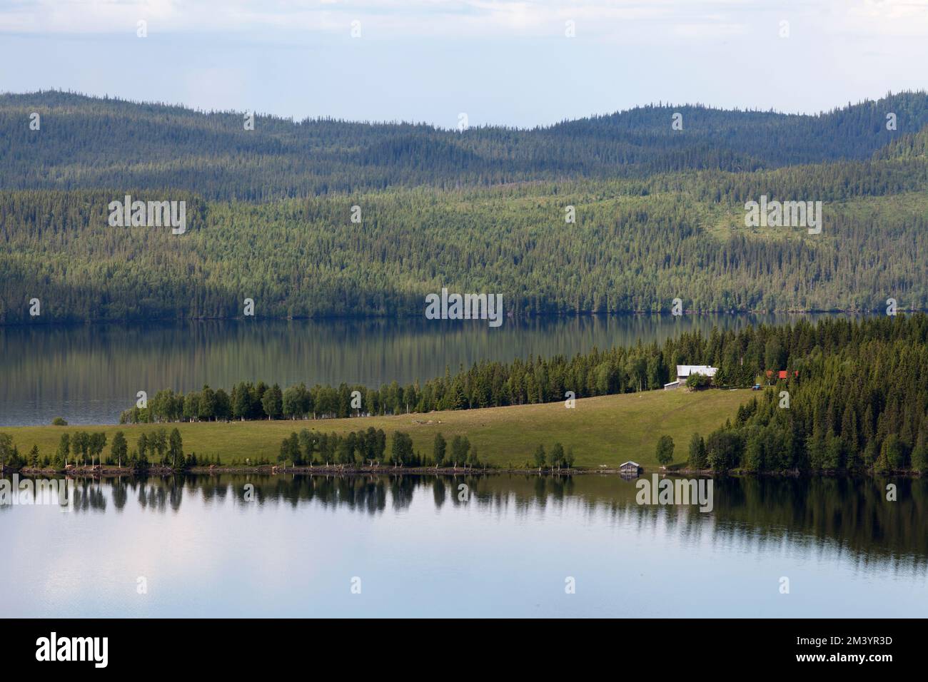 View from a distance of the Nordic rural countryside. Buildings and ...