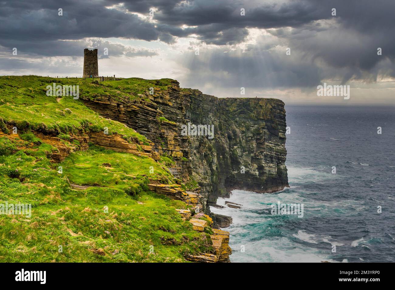 High above the cliffs, the Kitchener Memorial, Orkney Islands, United ...