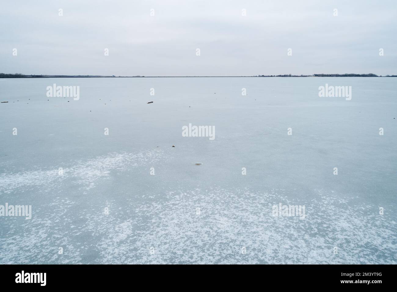 Cold frozen lake in winter Stock Photo - Alamy