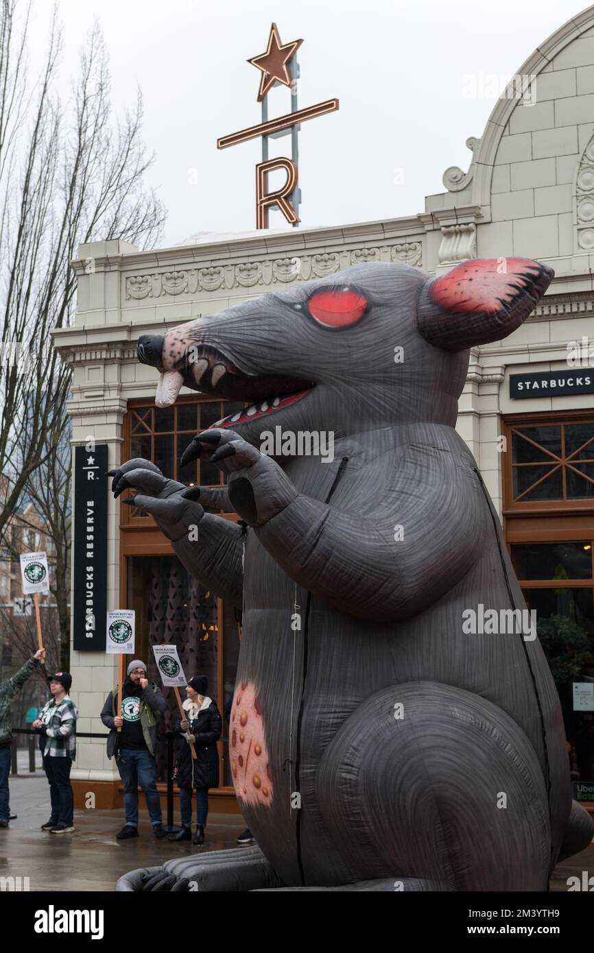 Seattle, USA. 17th Dec, 2022. Starbucks employees on strike outside the ...