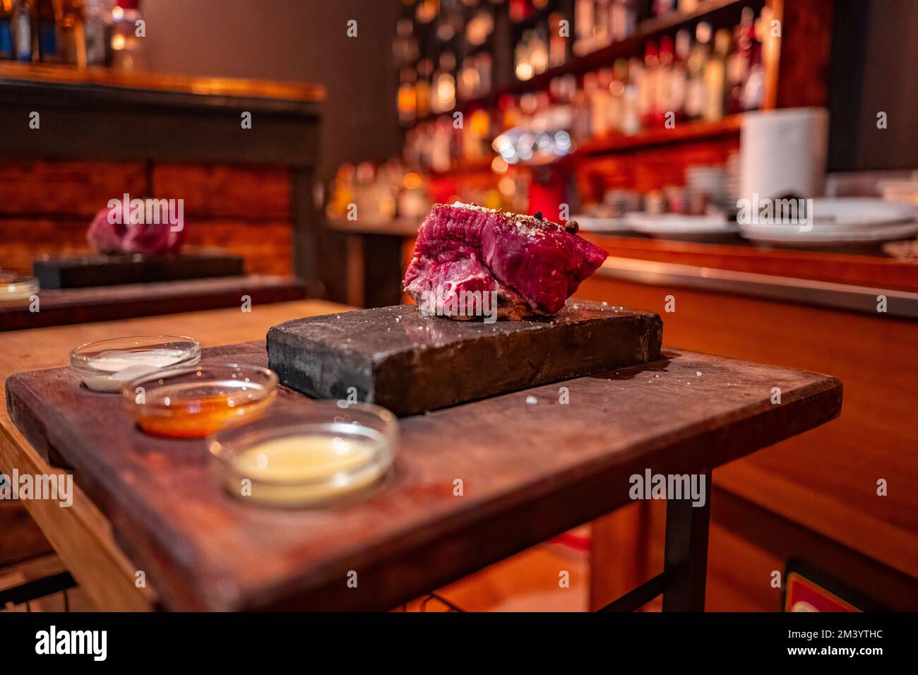 Steak on rock Stock Photo - Alamy